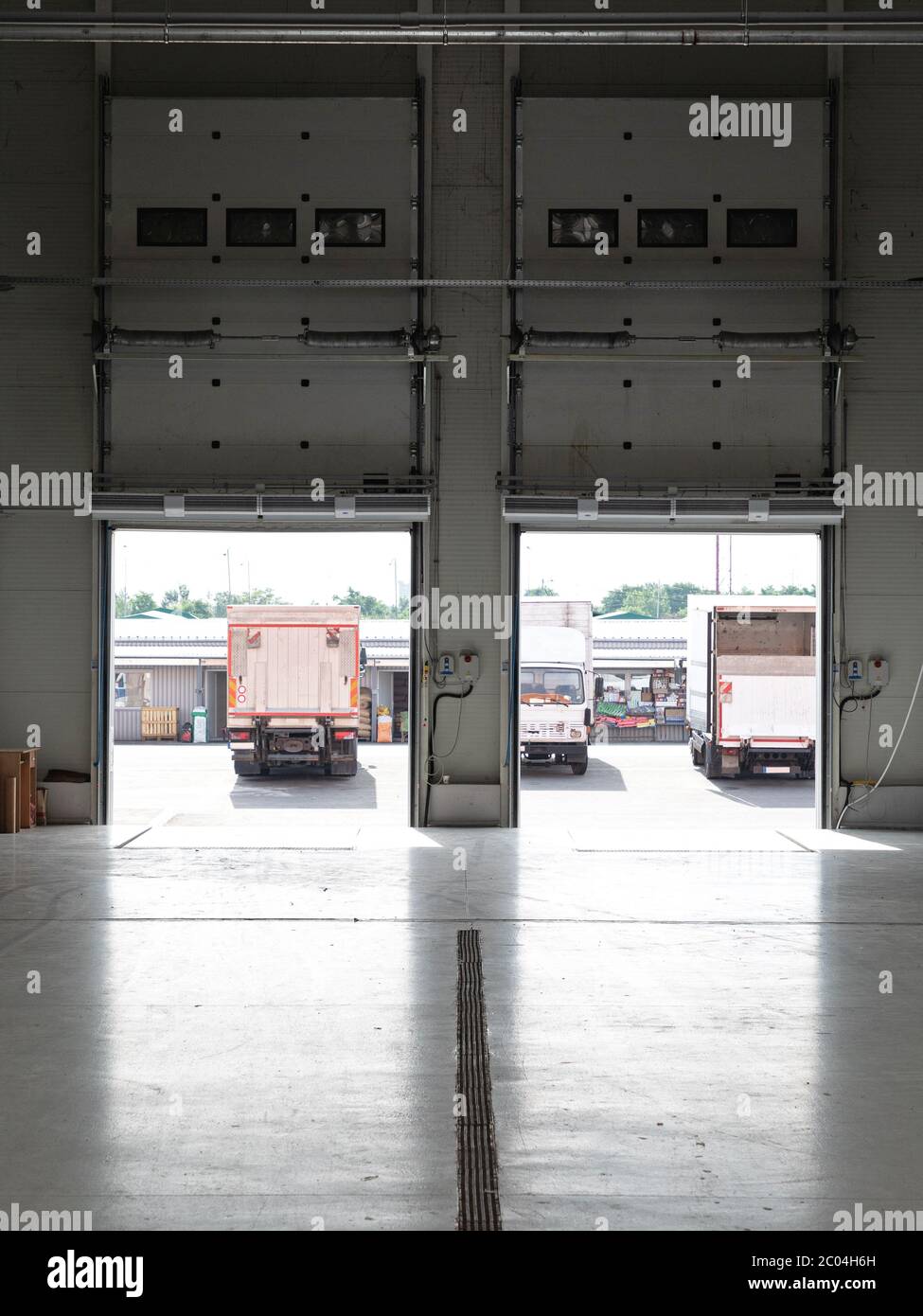 Loading Cargo Doors in Distribution Warehouse Stock Photo - Alamy