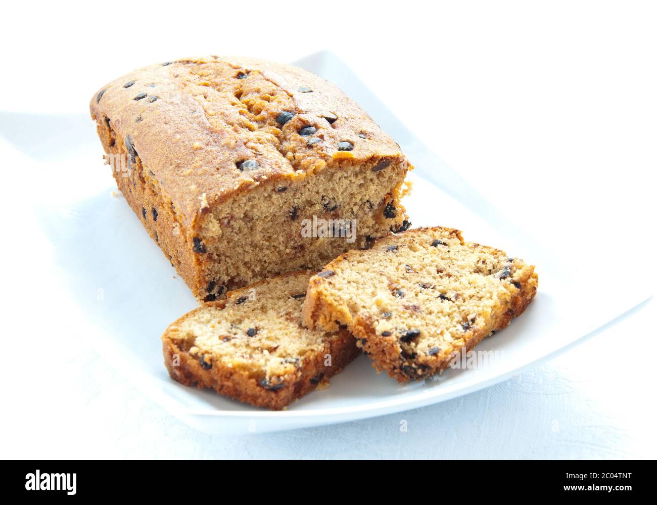 Plum cake with cocoa, apple and fruit and nuts Stock Photo - Alamy