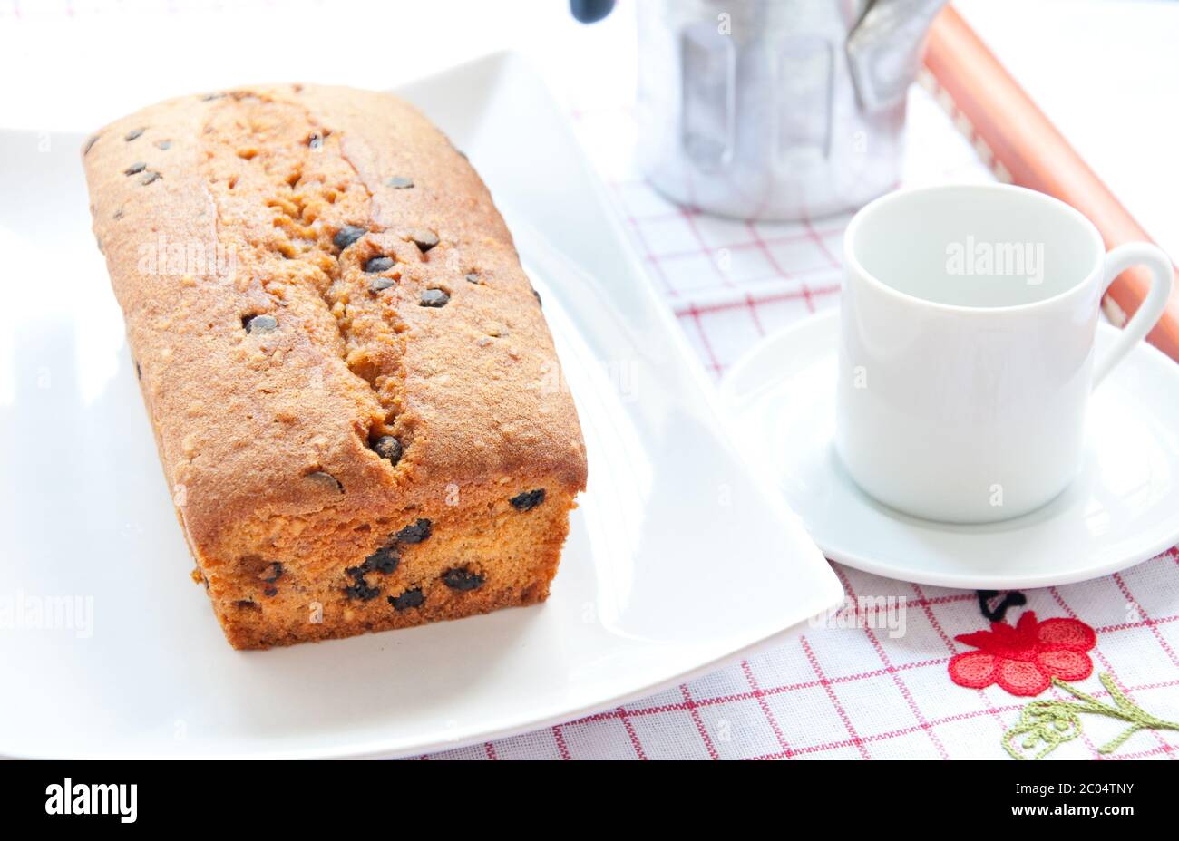 Plum cake with cocoa, apple and fruit and nuts Stock Photo - Alamy