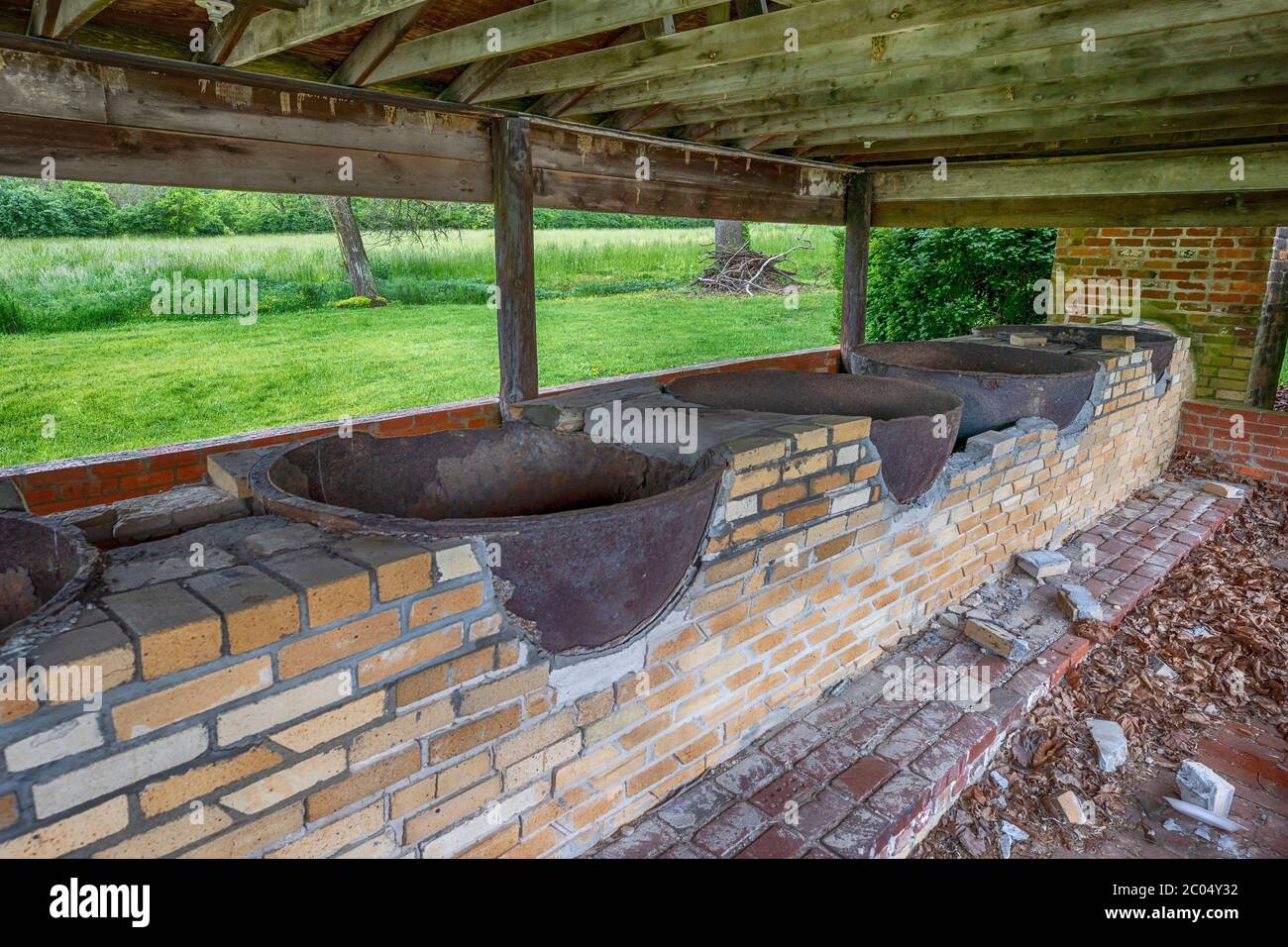 Replica of a salt furnace with original iron kettles at Salt Park in ...