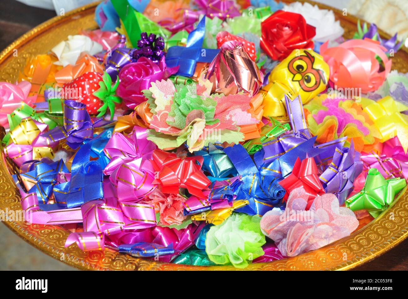 almsgiving with ribbon-flowers for giving alms to make merit in ...