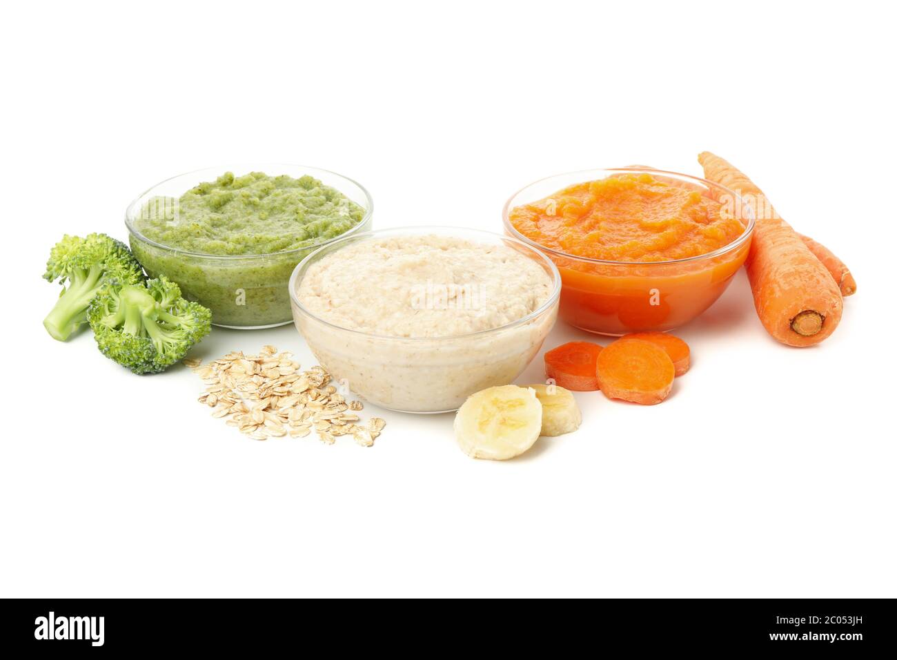 Bowls with healthy baby food isolated on white background Stock Photo ...