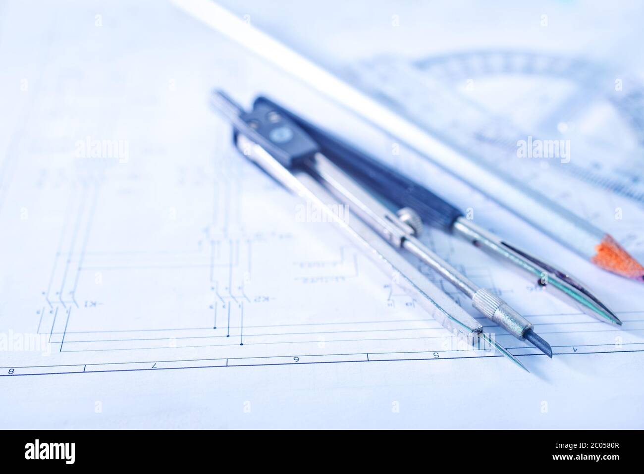 Compass and ruler lie on the drawing Stock Photo - Alamy