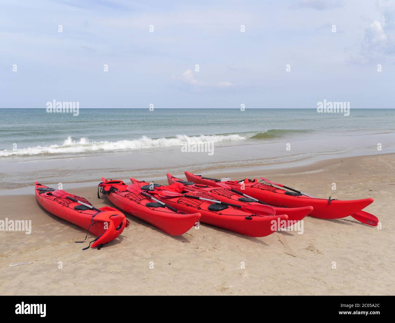 Canoes on the beach Stock Photo - Alamy