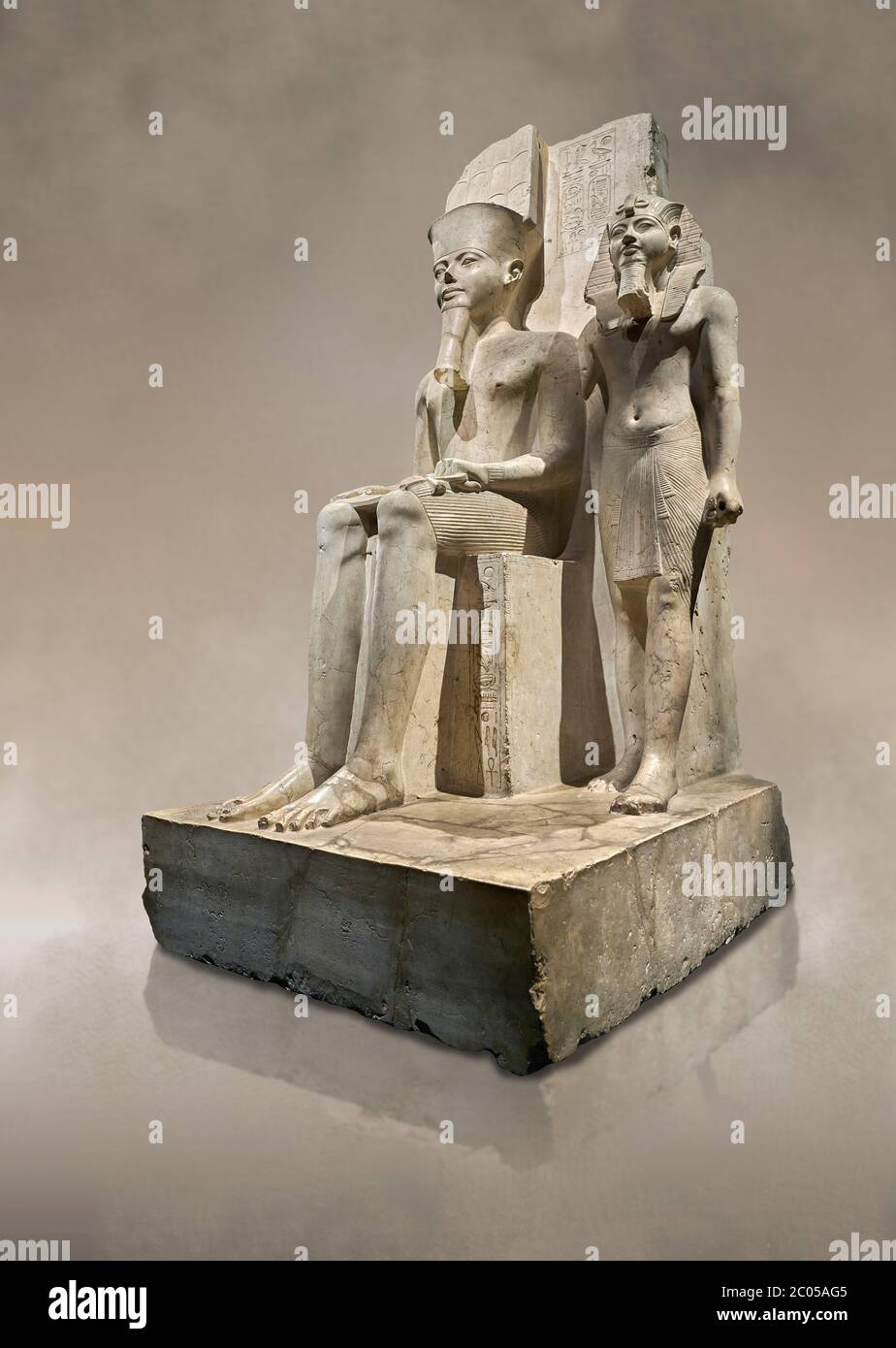 Ancient Egyptian statue of pharaoh Horemheb with god Amun, limestone ...