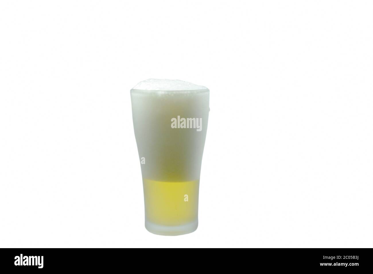 cold beer with frothy in glass on white background Stock Photo - Alamy