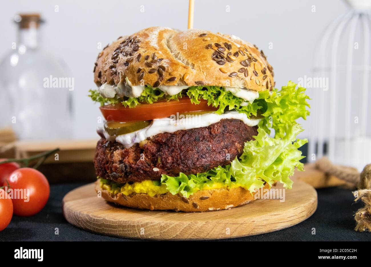 Burger on a plate Stock Photo - Alamy
