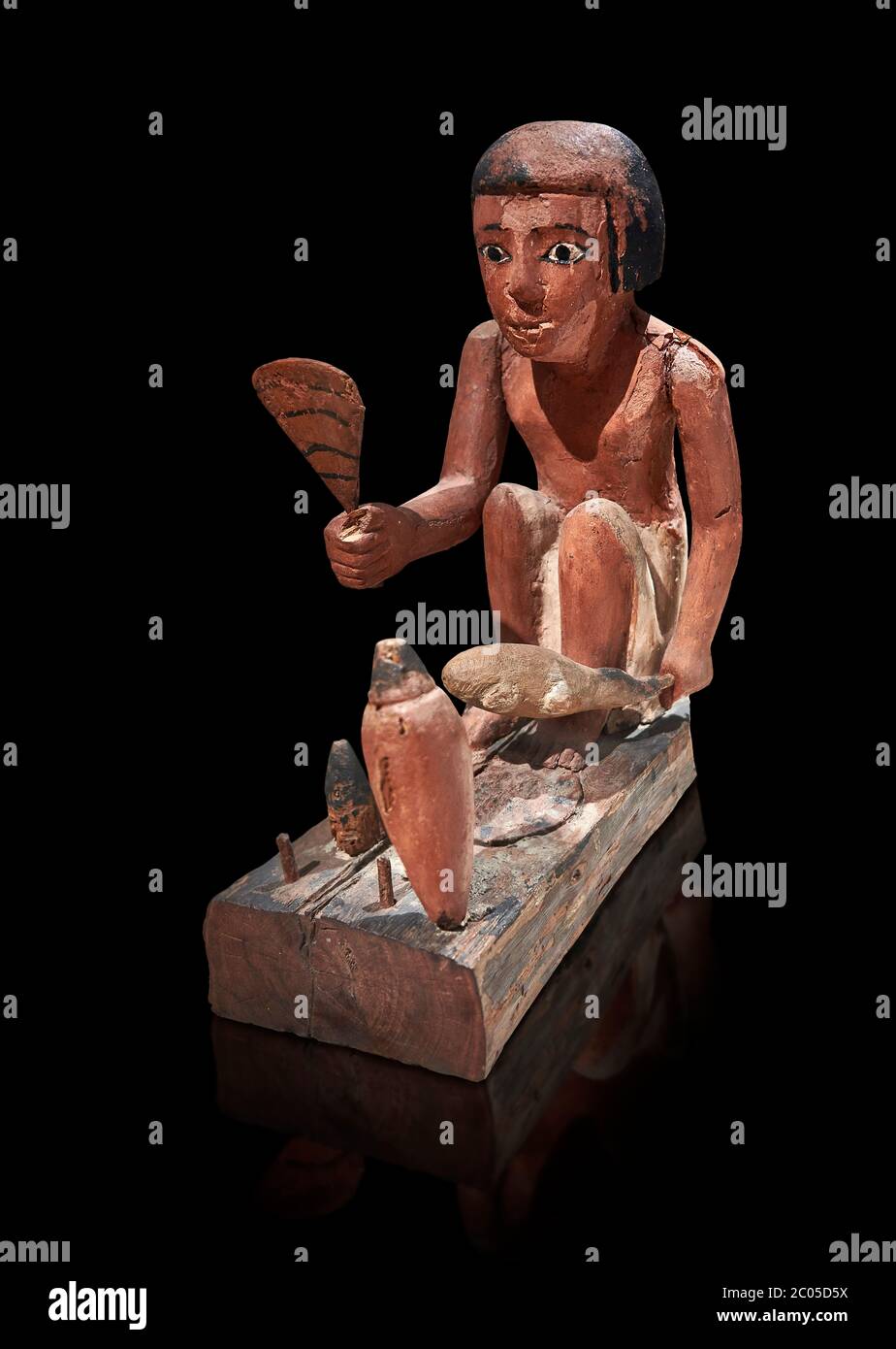Ancient Egyptian wooden model of a man cooking a duck, New Kingdom, 11 ...