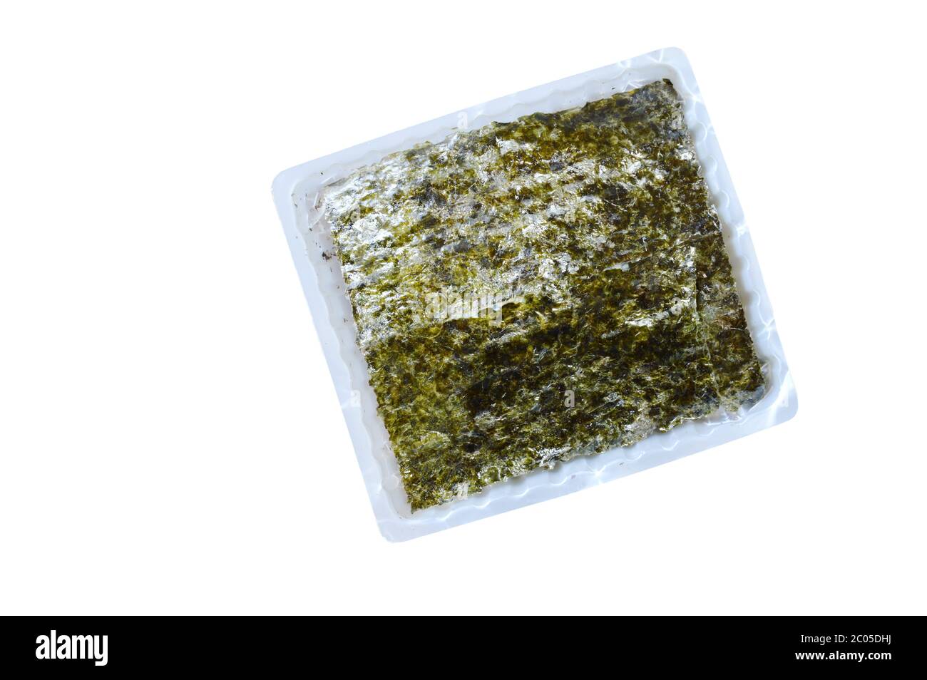 raw seaweed for cooking on white background Stock Photo - Alamy