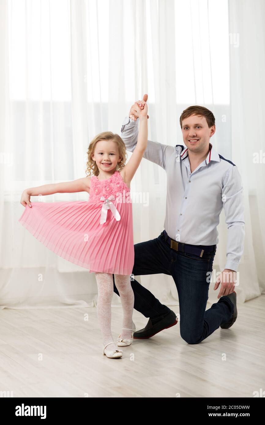 Little princess dancing with father Stock Photo - Alamy