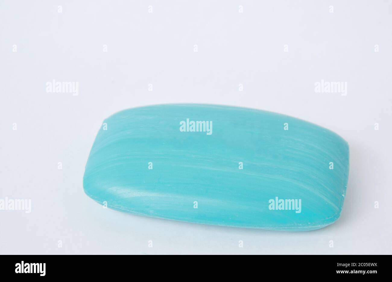 blue soap bar on white background Stock Photo - Alamy