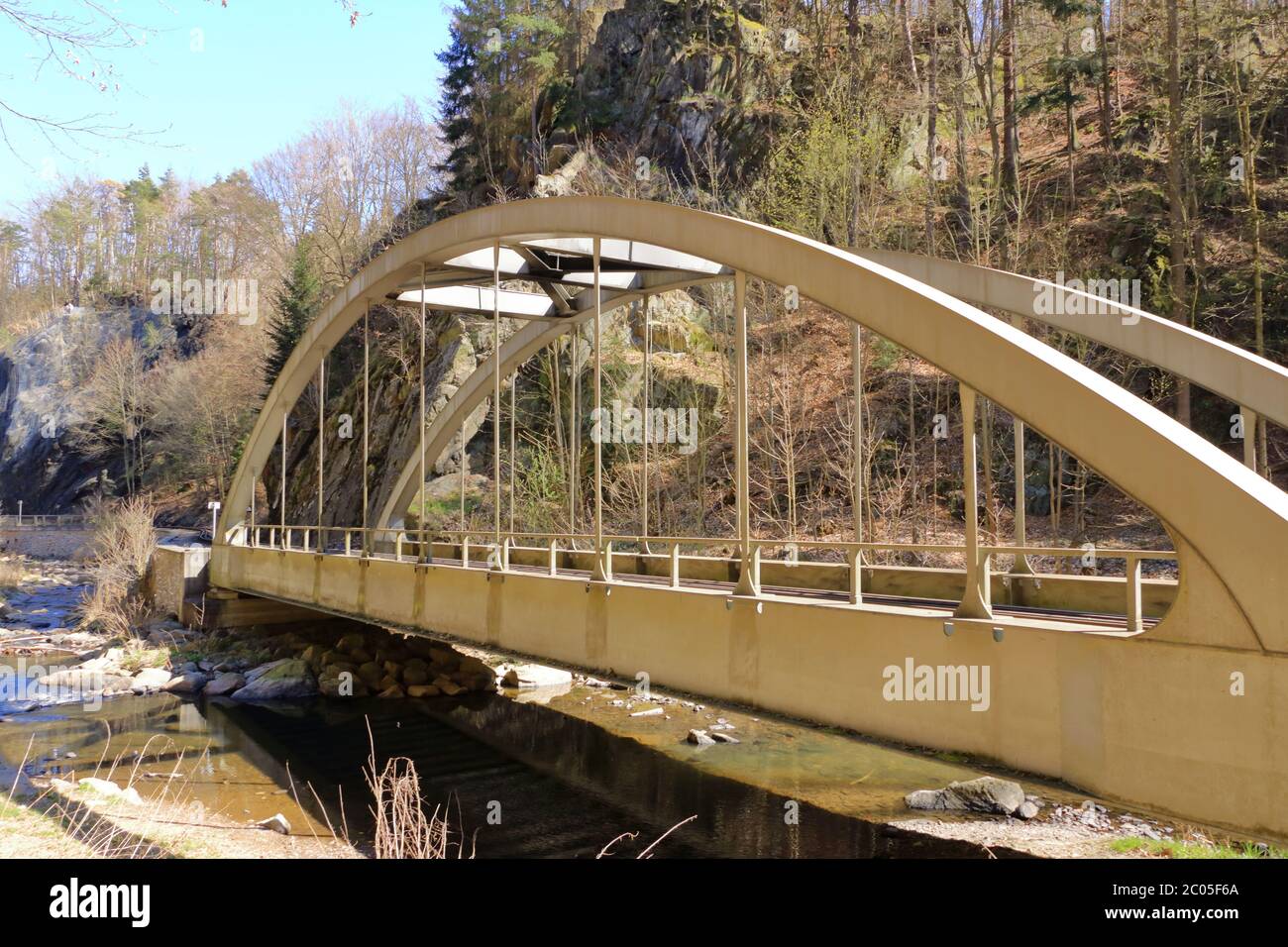 A Small old rusty steel train trestle bridge Stock Photo - Alamy