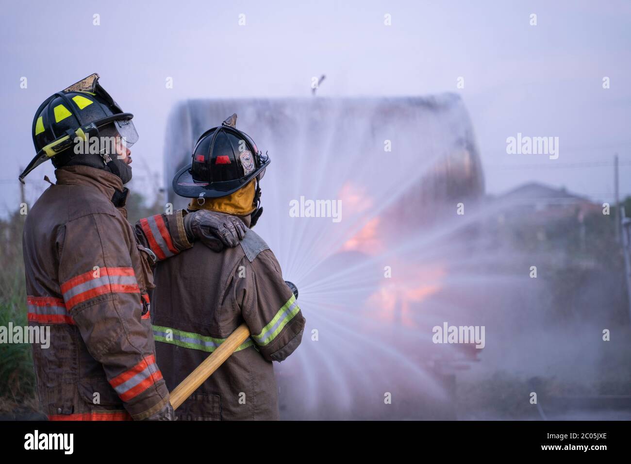 House fire flames firefighters hi-res stock photography and images - Alamy