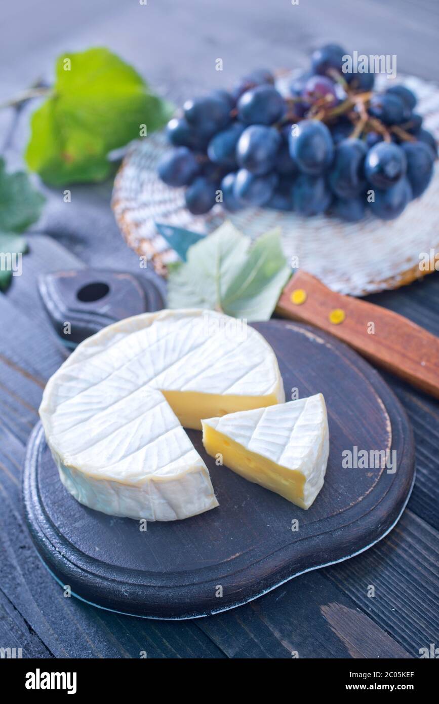 White mould full fat soft cheese hi-res stock photography and images ...