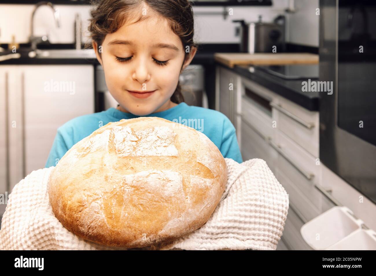 Child grocery bread hi-res stock photography and images - Alamy
