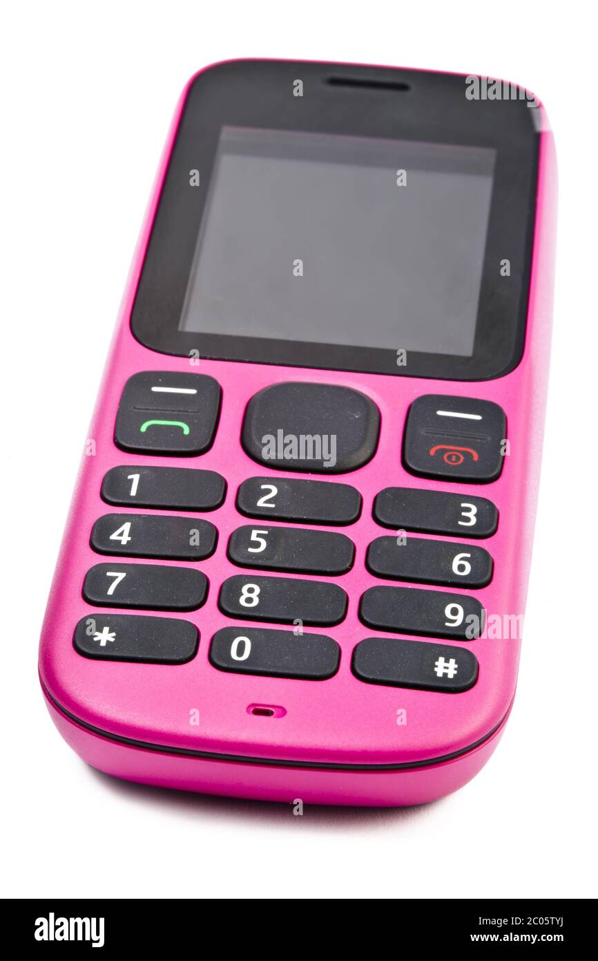 old push-button pink telephone Stock Photo - Alamy