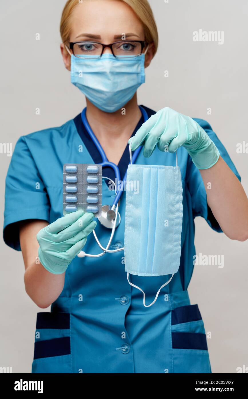 medical doctor nurse woman wearing protective mask and rubber or latex ...