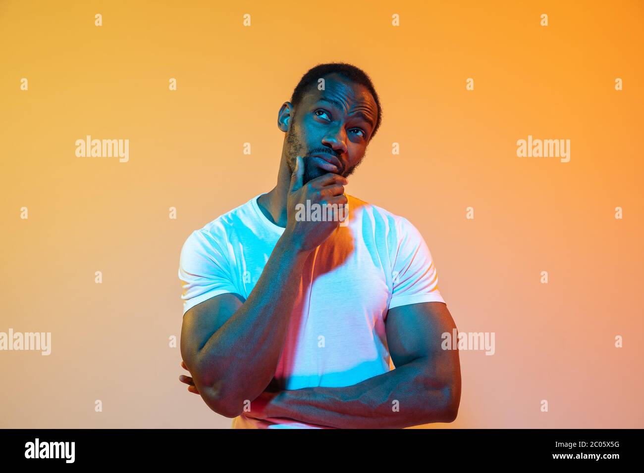 Thoughtful, thinking. African-american man's modern portrait on ...