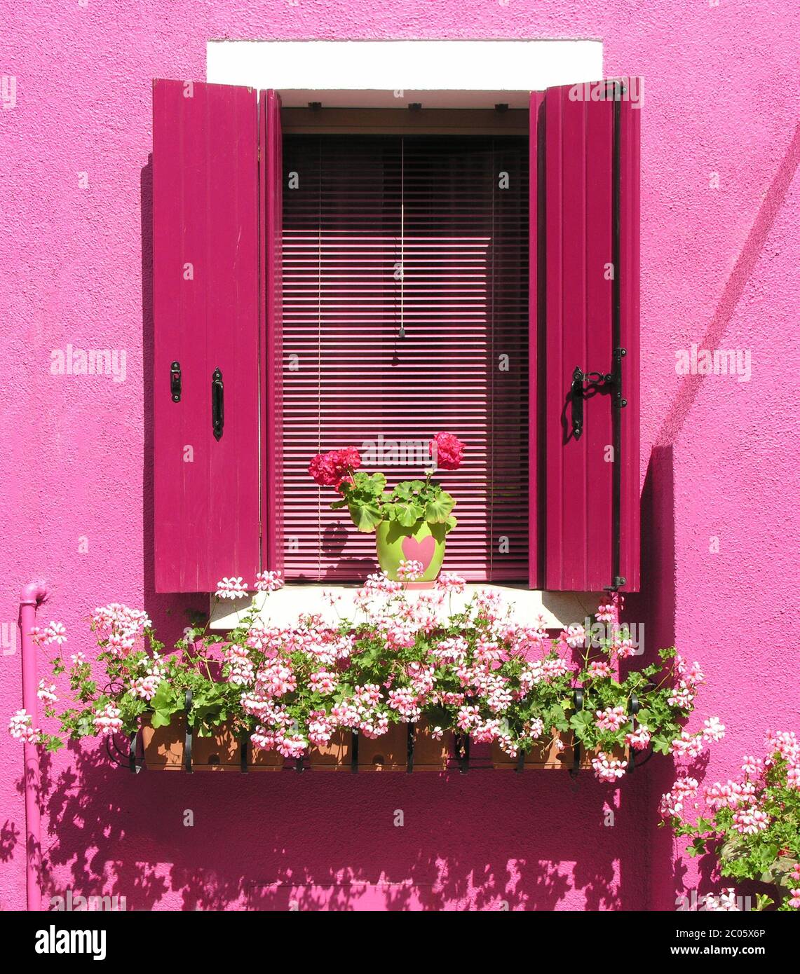 pink window in Burano Stock Photo - Alamy