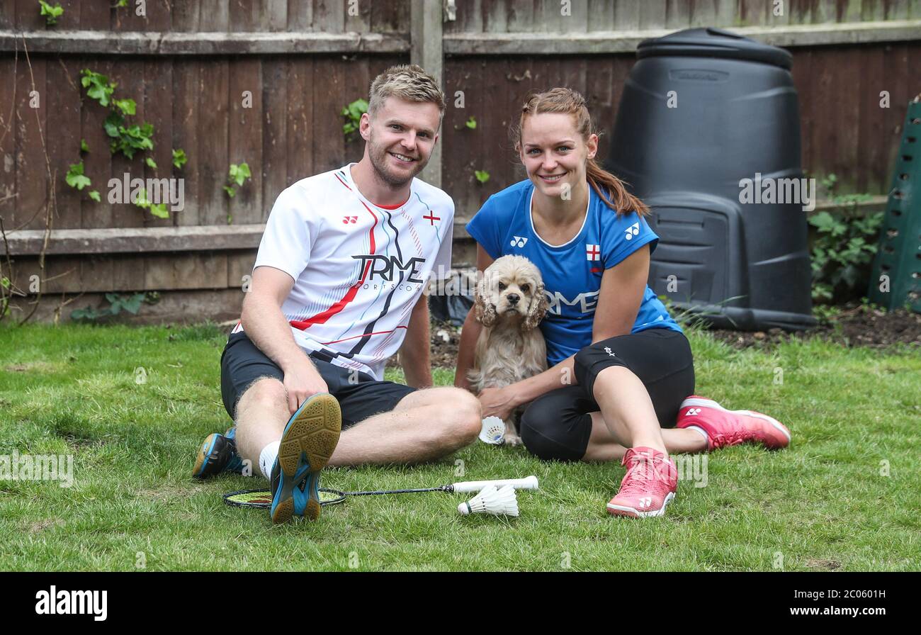 Badminton players Lauren Smith and Marcus Ellis practice in the back ...