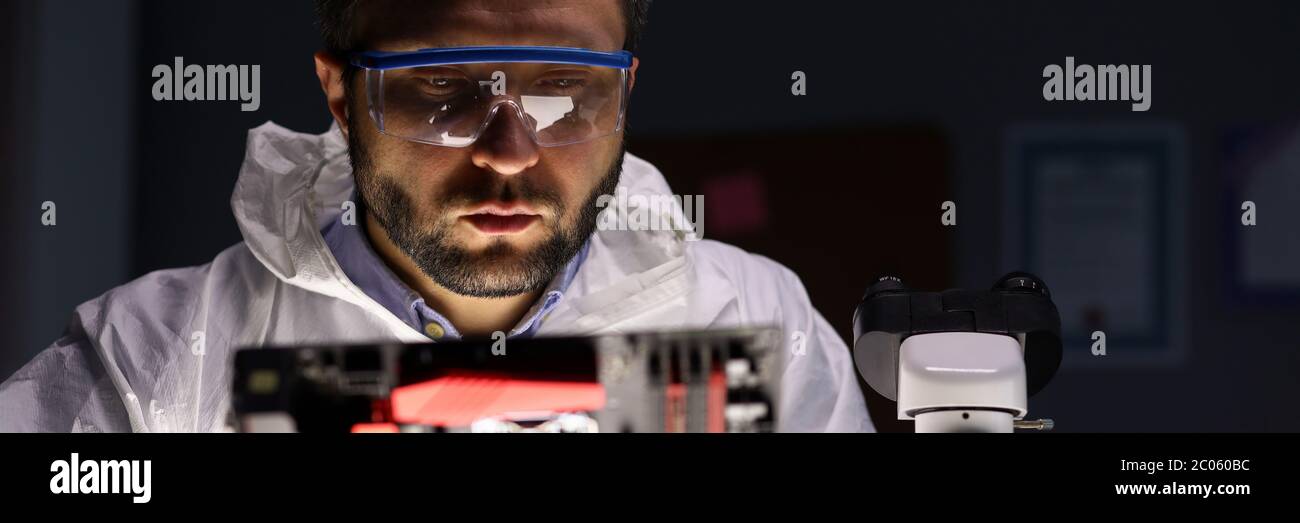 Computer technician specialist fixing pc component Stock Photo - Alamy