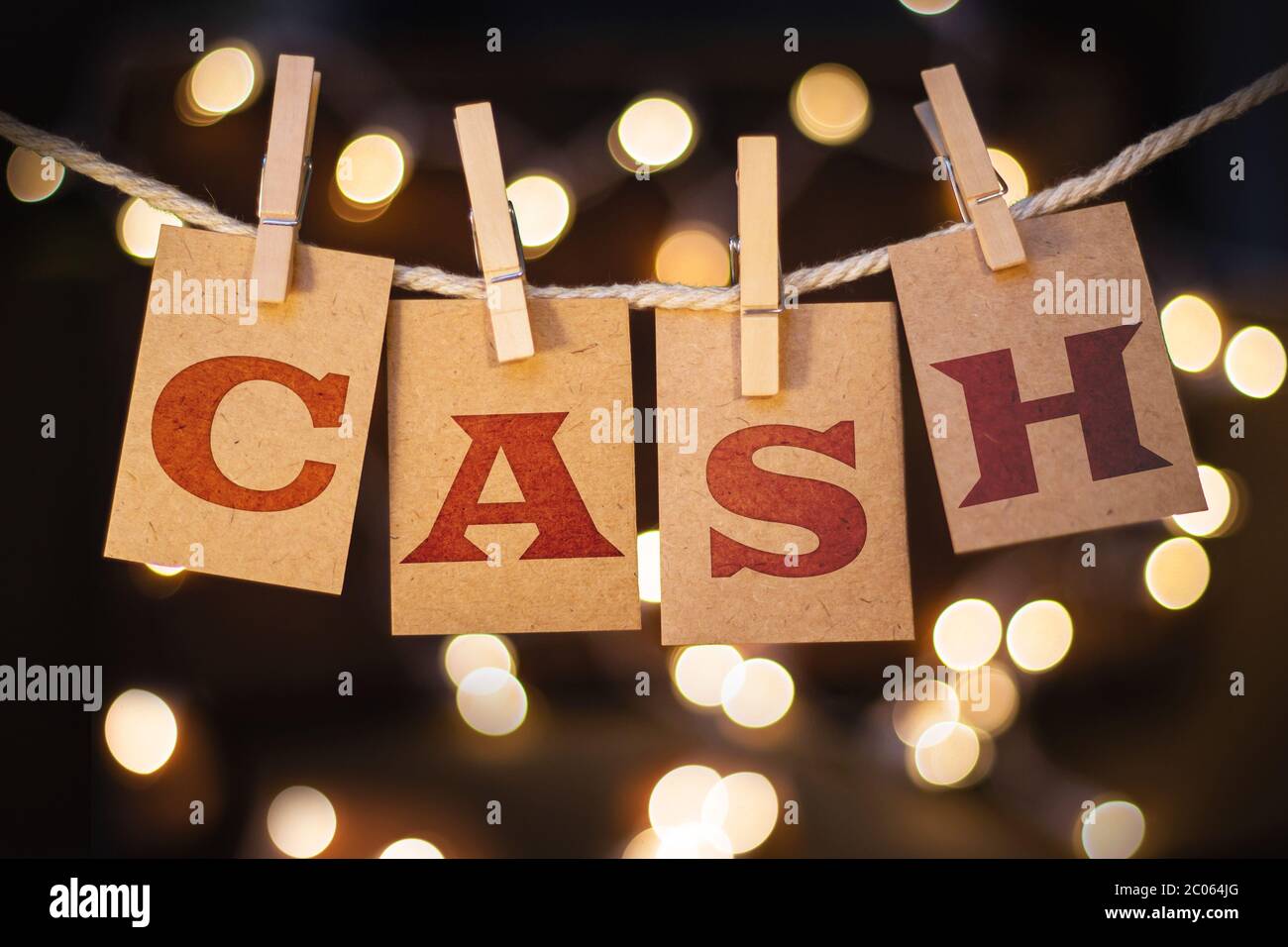 Cash Concept Clipped Cards and Lights Stock Photo - Alamy
