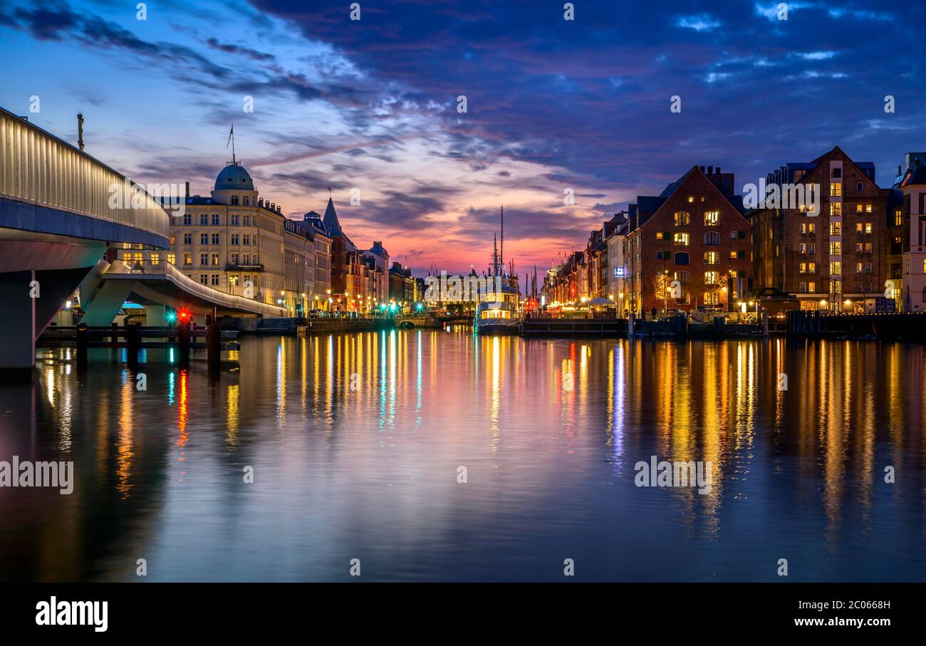 View of Nyhavn at sunset, night shot, Copenhagen, Denmark Stock Photo ...