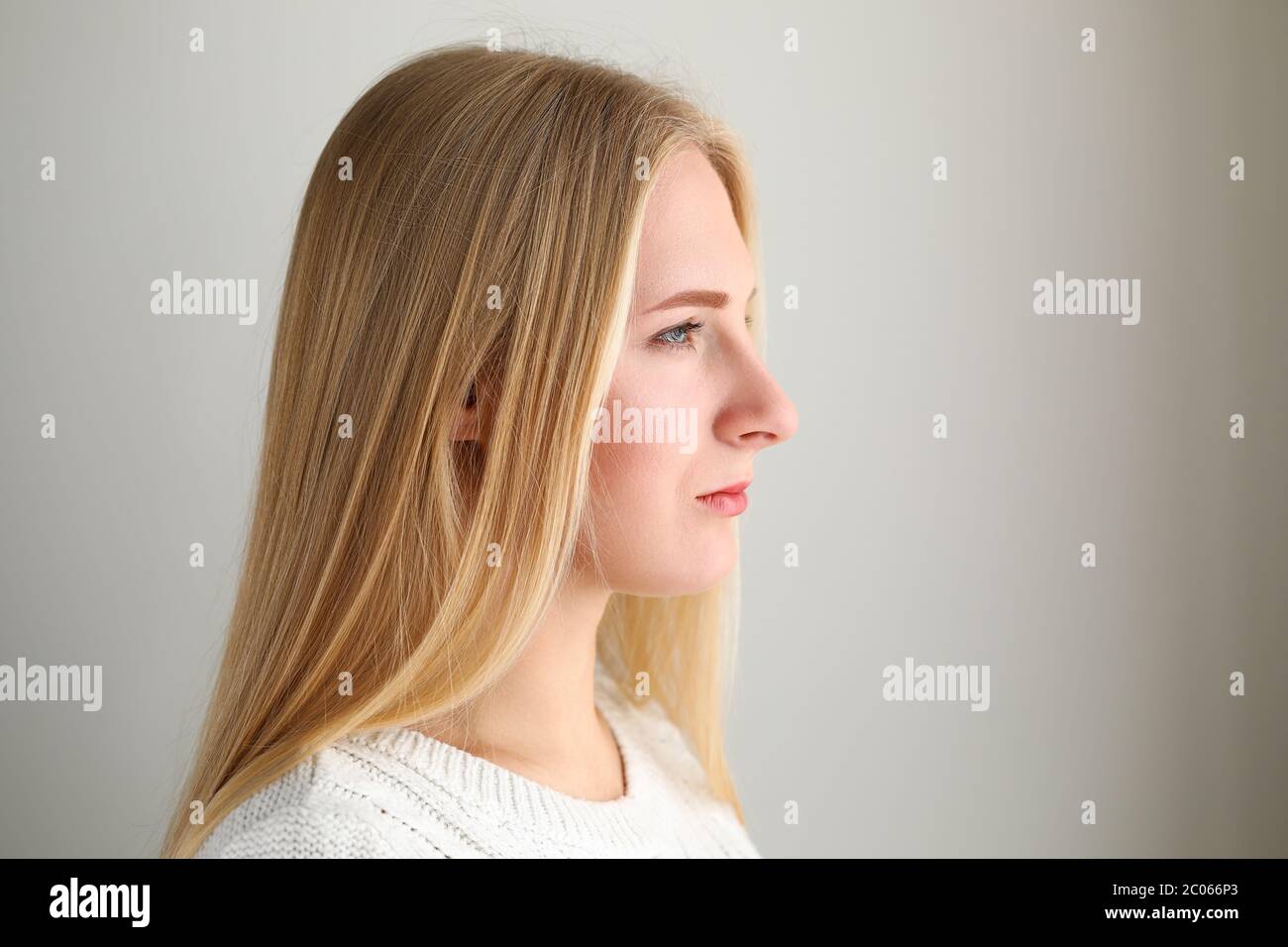 White sweater profile hi-res stock photography and images - Alamy