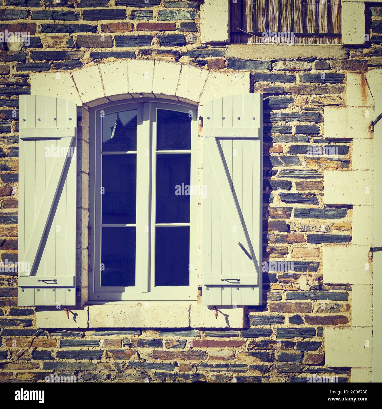 Windows french brick house hi-res stock photography and images - Alamy