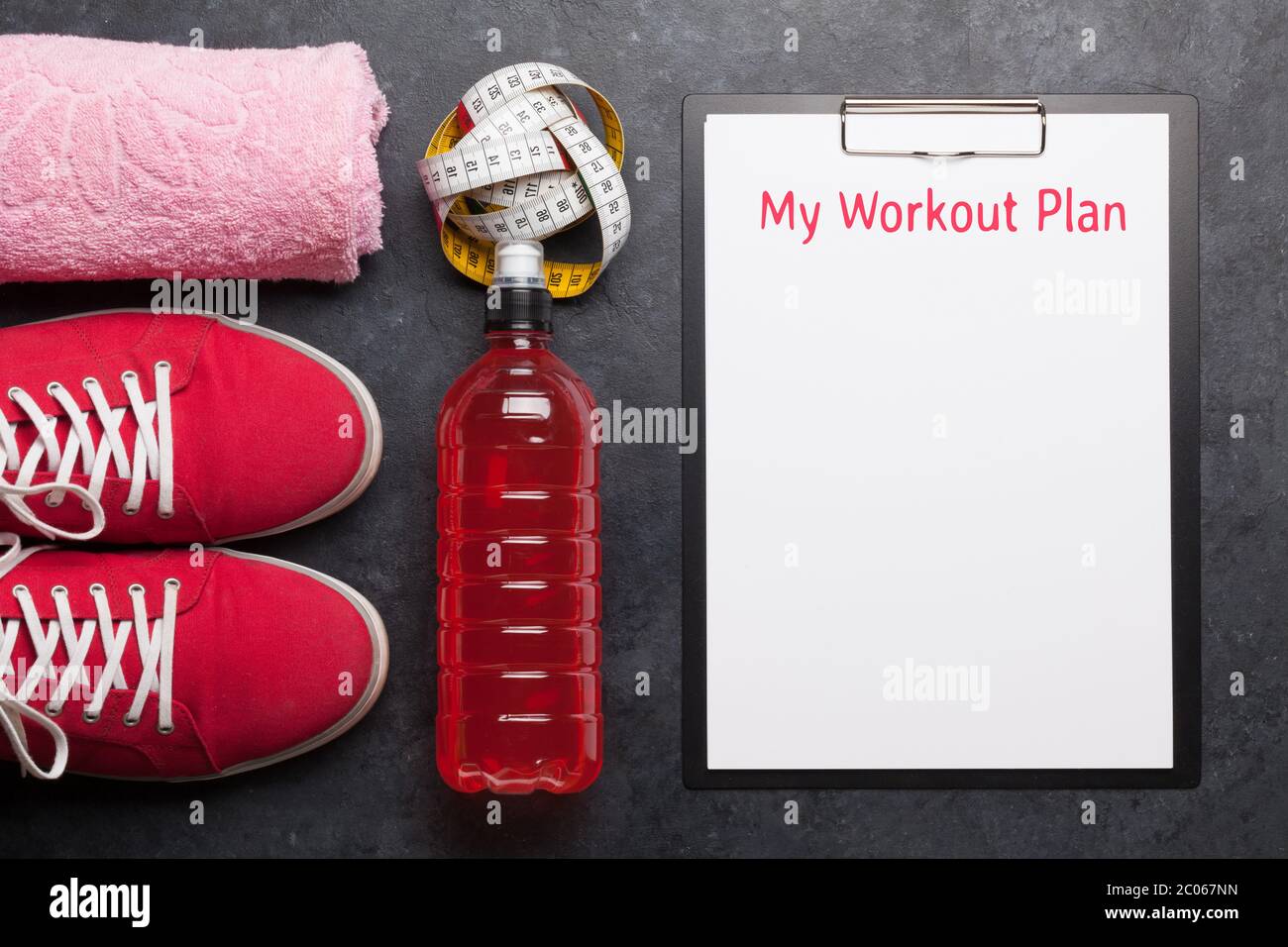 Fitness equipment and blank sheet for workout plan on a stone ...