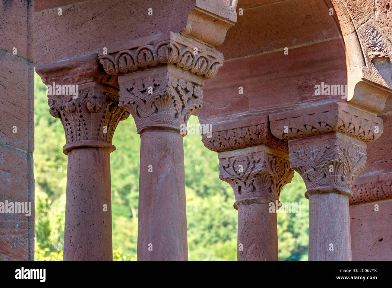 Columns of the arcades, palace wall, medieval castle ruins, imperial ...