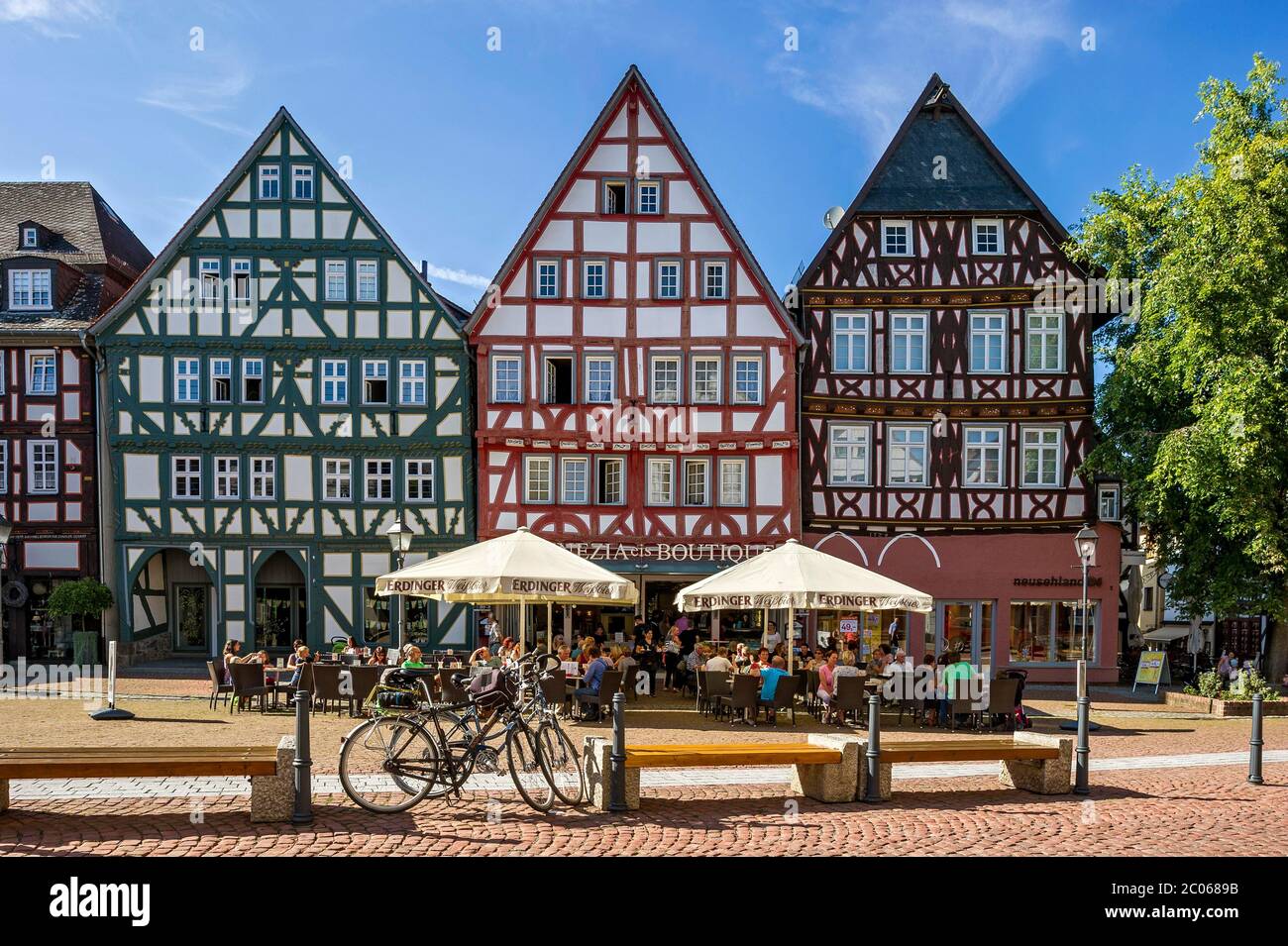 Historic half-timbered houses, ice cream parlour, market place, old ...