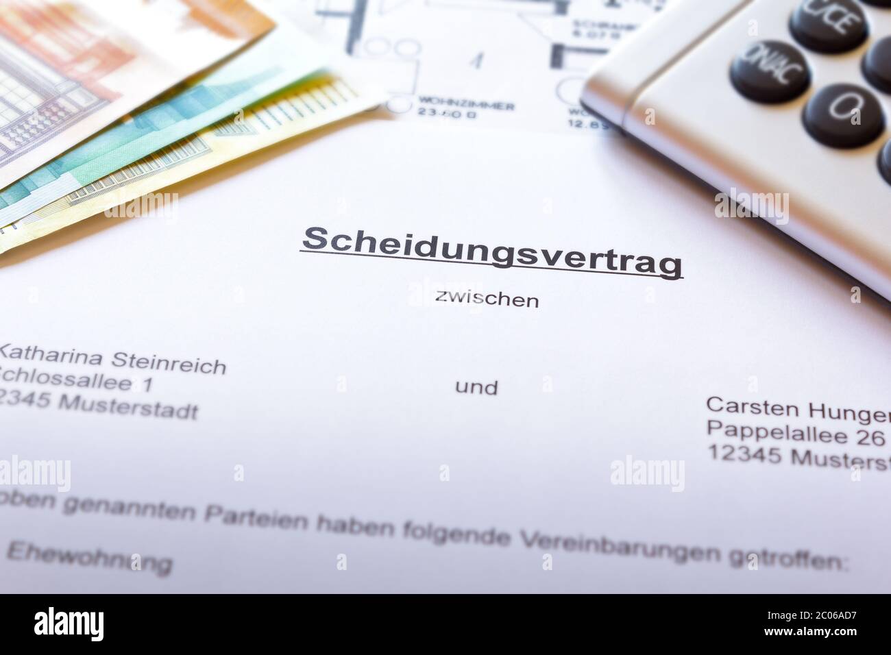 Divorce settlement contract paper in german with money, floor plan and ...