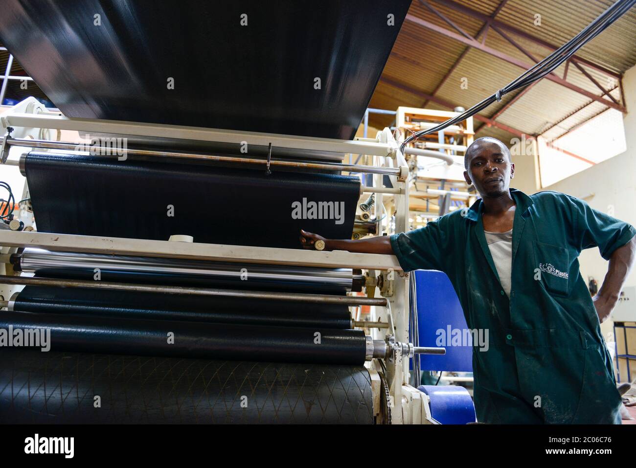 RWANDA, Kigali, plastic recycling at company Ecoplastics, machine Kabra ...