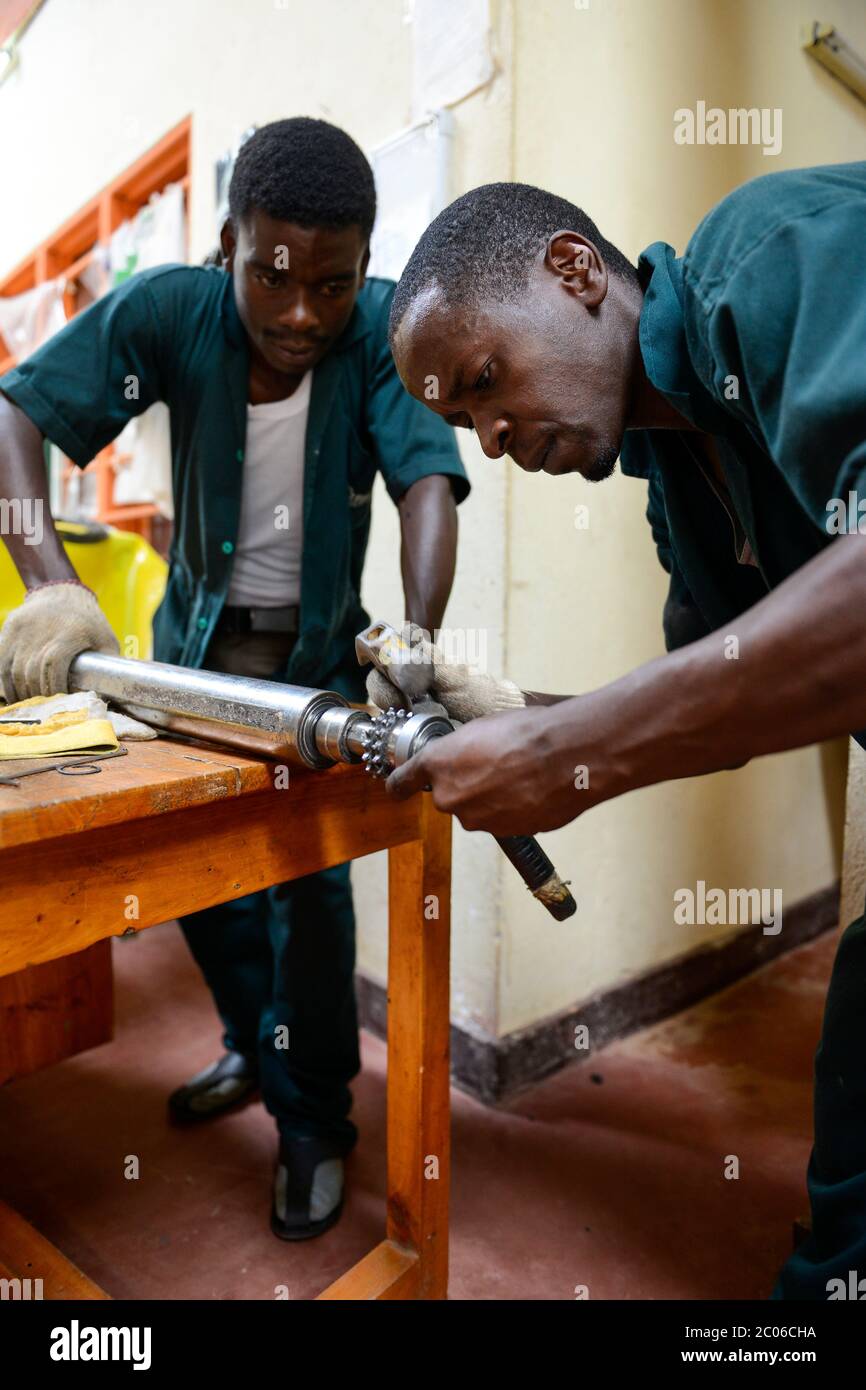 RWANDA, Kigali, plastic recycling at company Ecoplastics, mechanic ...