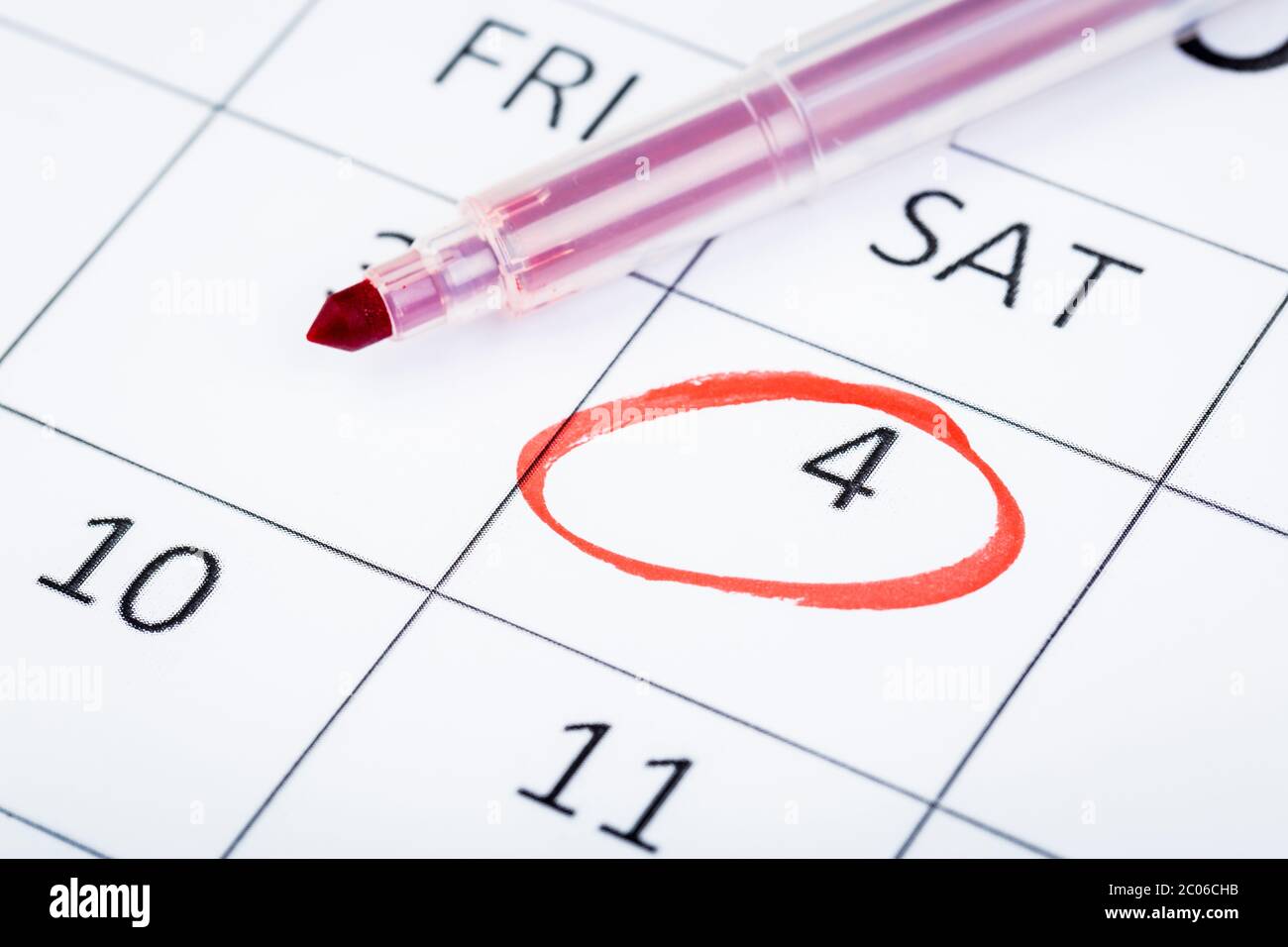 2020 calendar page with pen. important date marked Stock Photo - Alamy