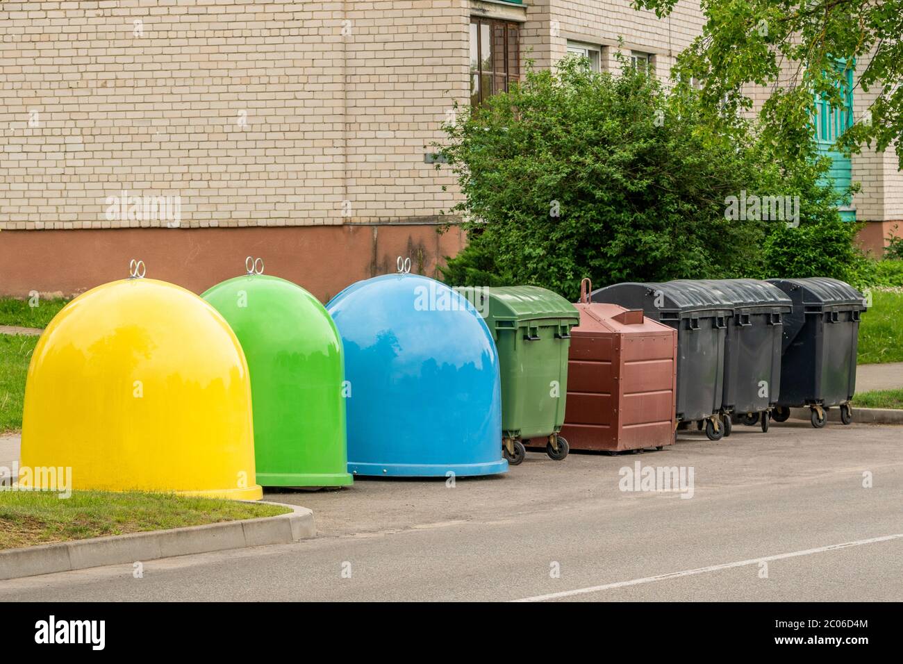 The different garbage bins on the street in residential area Stock ...