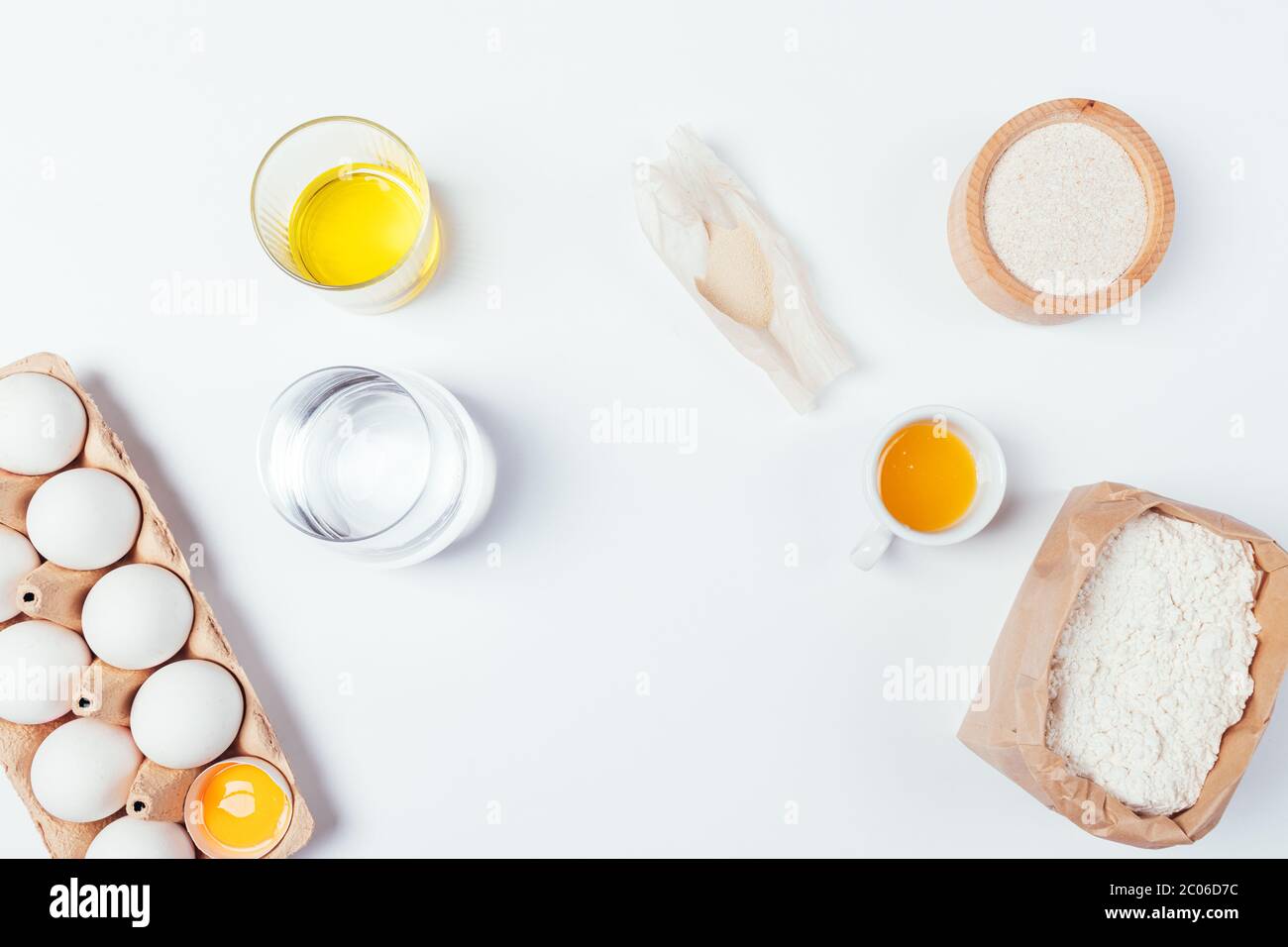 Cooking homemade bread, ingredients for the dough eggs, flour, water ...
