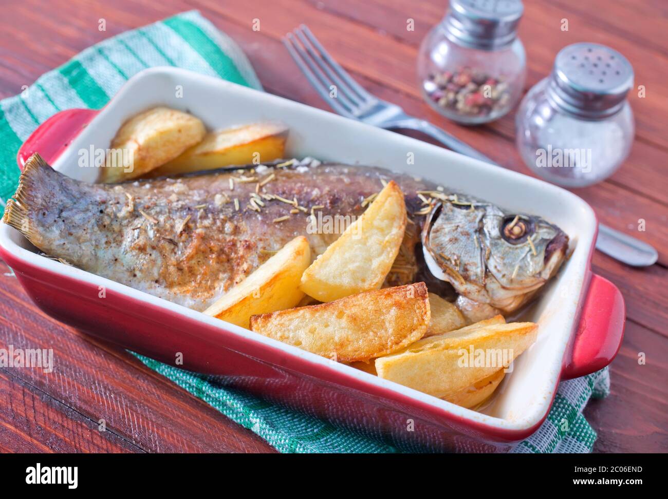 baked fish and potato Stock Photo - Alamy