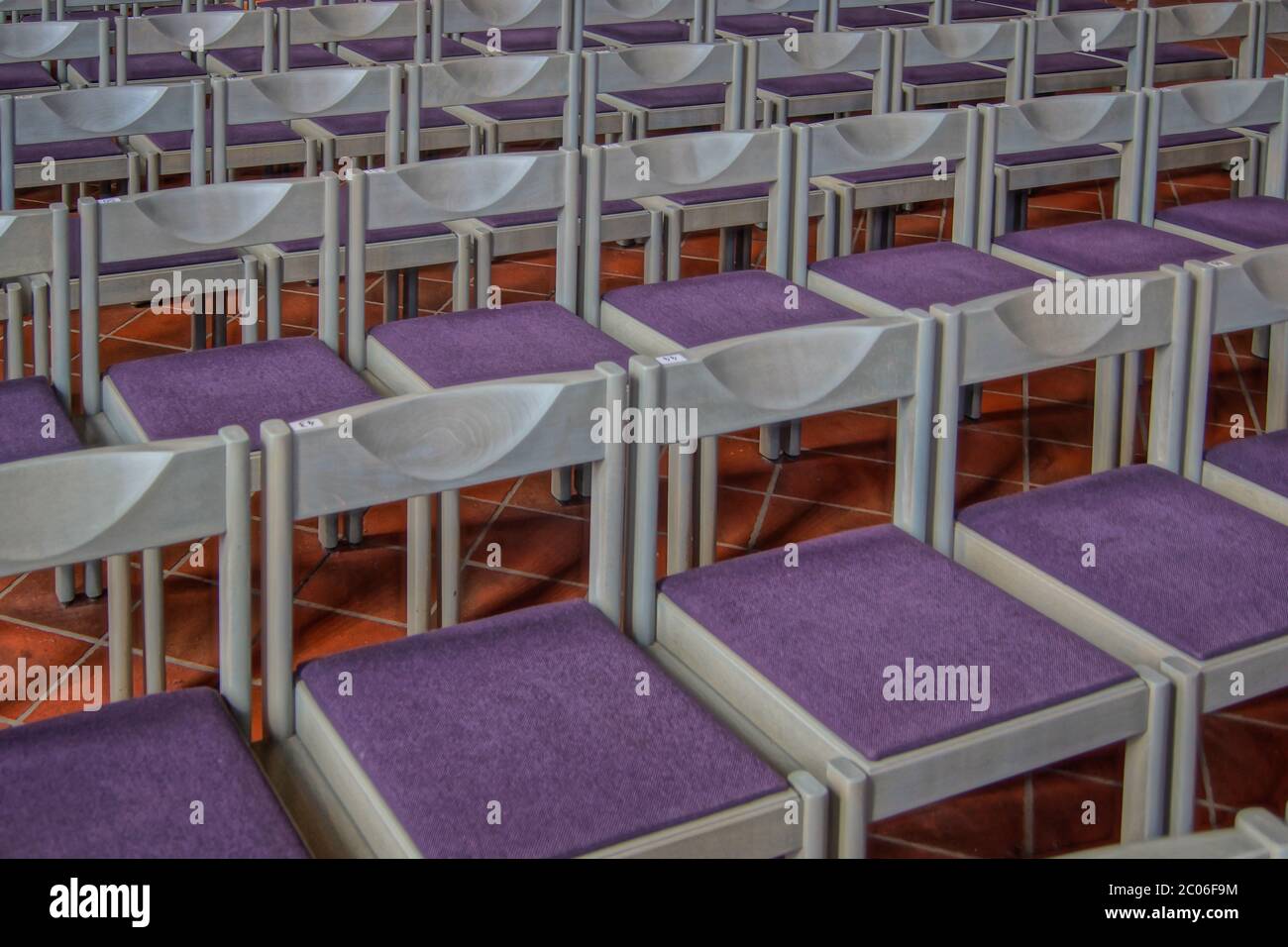 rows of empty chairs glued to each other waiting for the public Stock ...