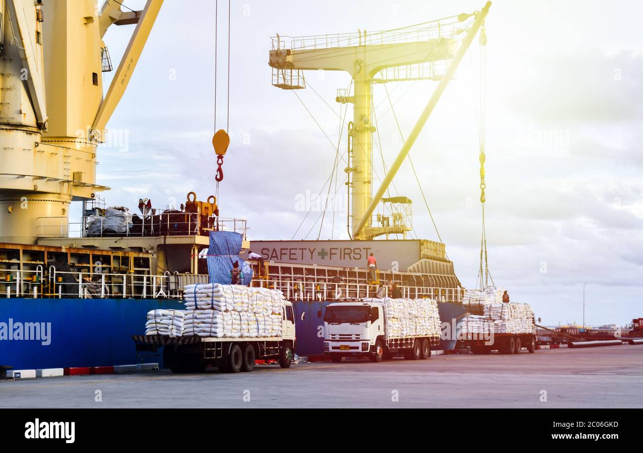 Sugar bags product vessel loading activities, vessel crane lift up bag ...