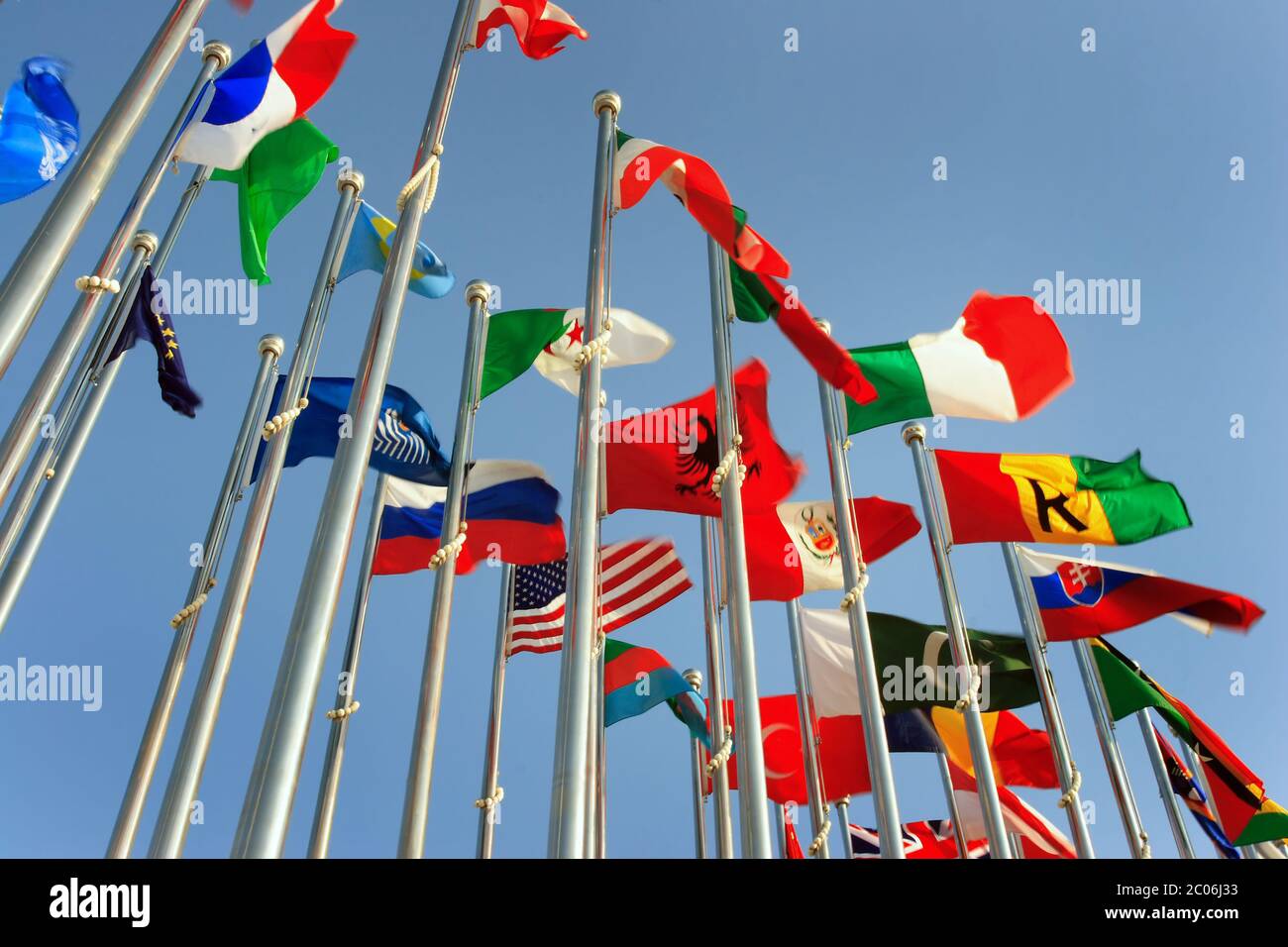 Different countries flags united together against blue sky Stock Photo ...