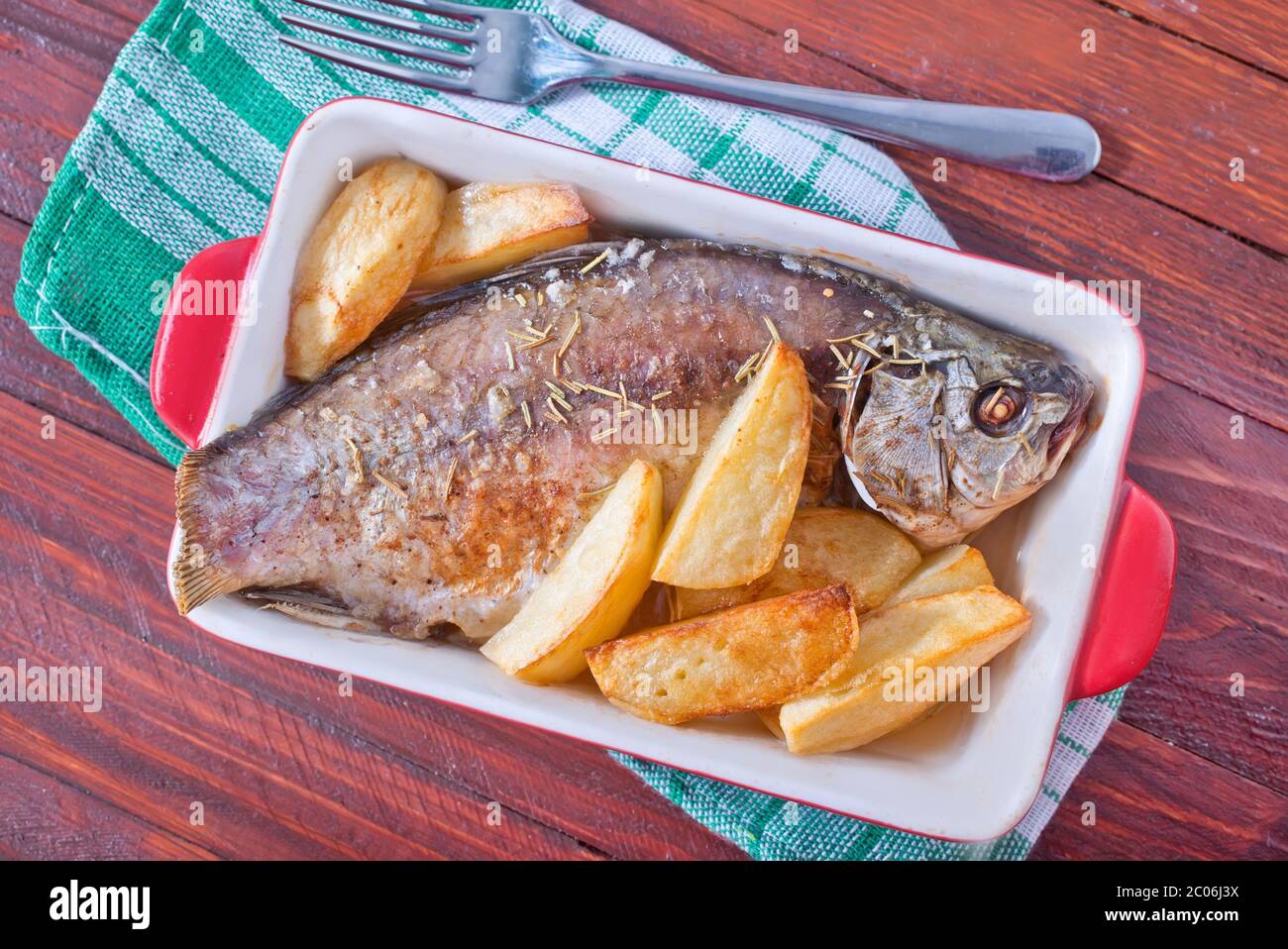 baked fish and potato Stock Photo - Alamy