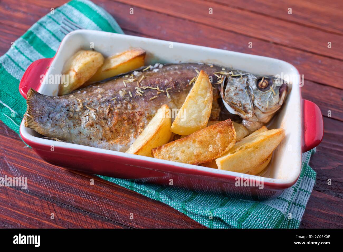 baked fish and potato Stock Photo - Alamy