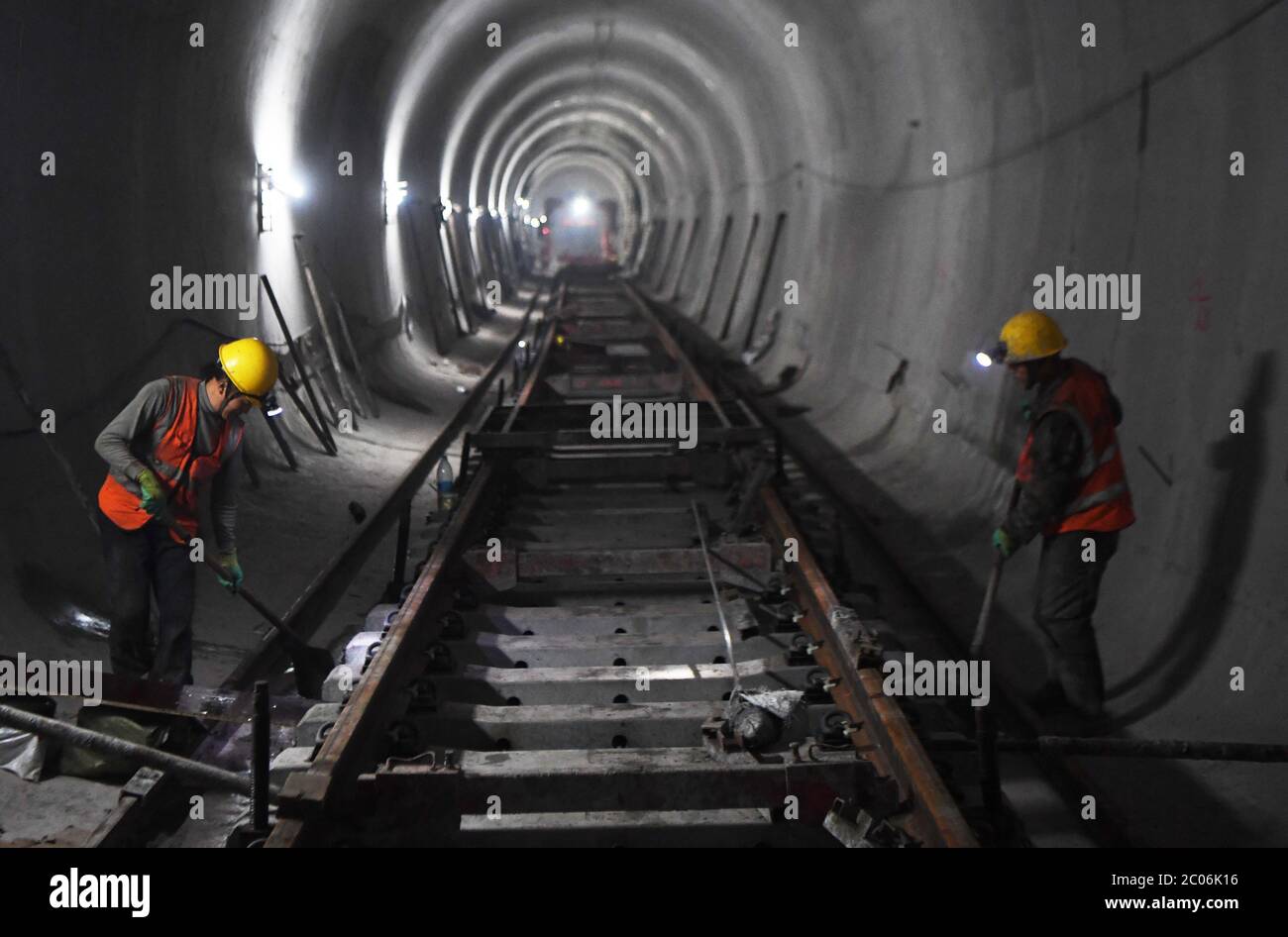 Chongqing. 10th June, 2020. Workers work at the construction site of ...
