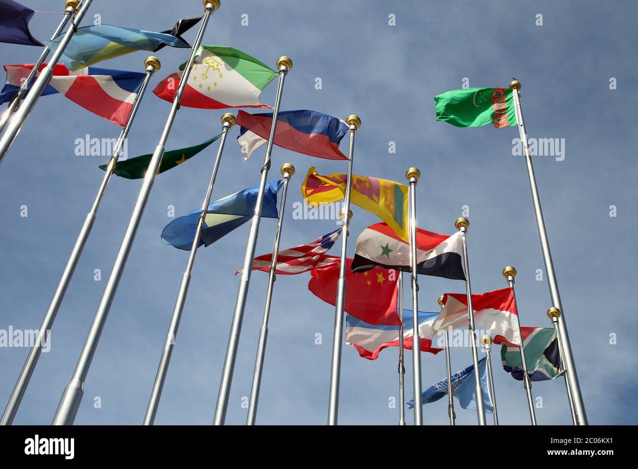 Different countries flags united together against blue sky Stock Photo ...