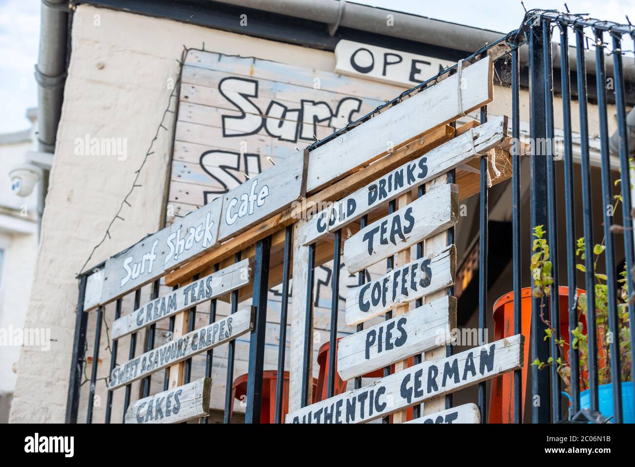 Saint Ives, Cornwall, UK. Handwritten driftwood signs at the Surf Shack ...