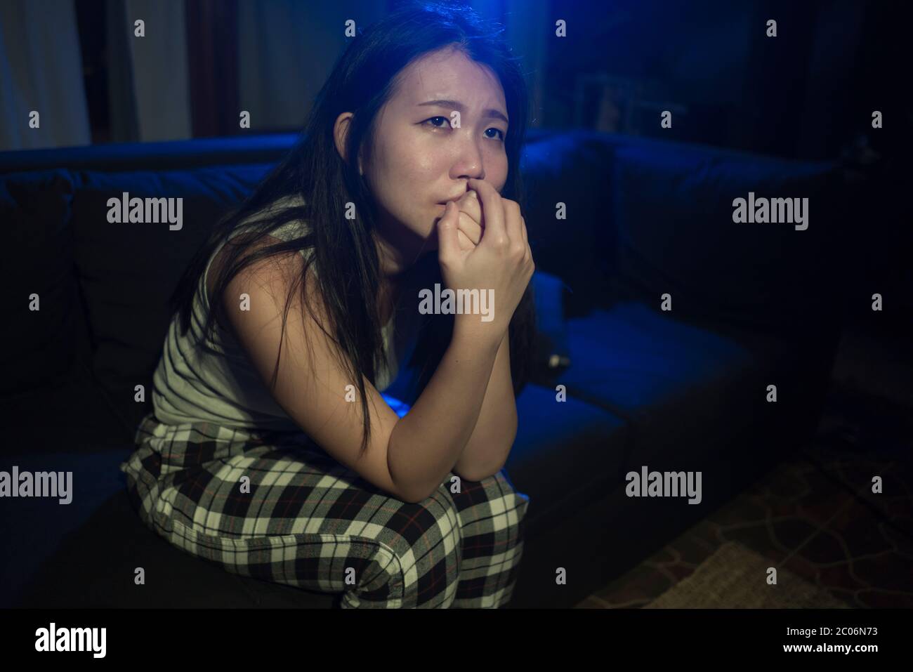 young beautiful sad and depressed Asian Korean woman crying in tears on ...