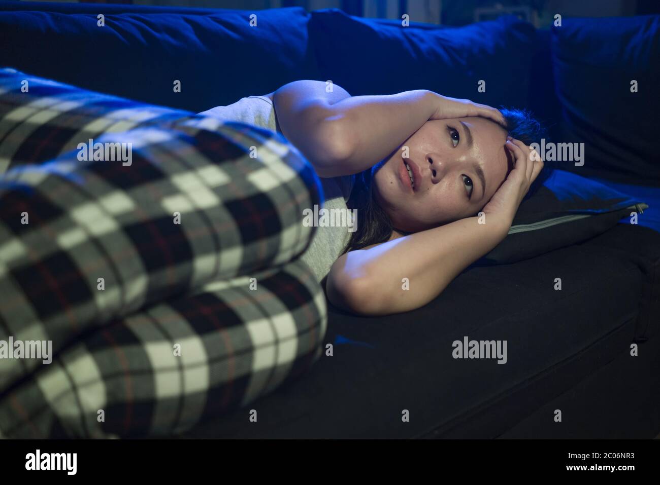 young beautiful sad and depressed Asian Korean woman crying in tears on ...