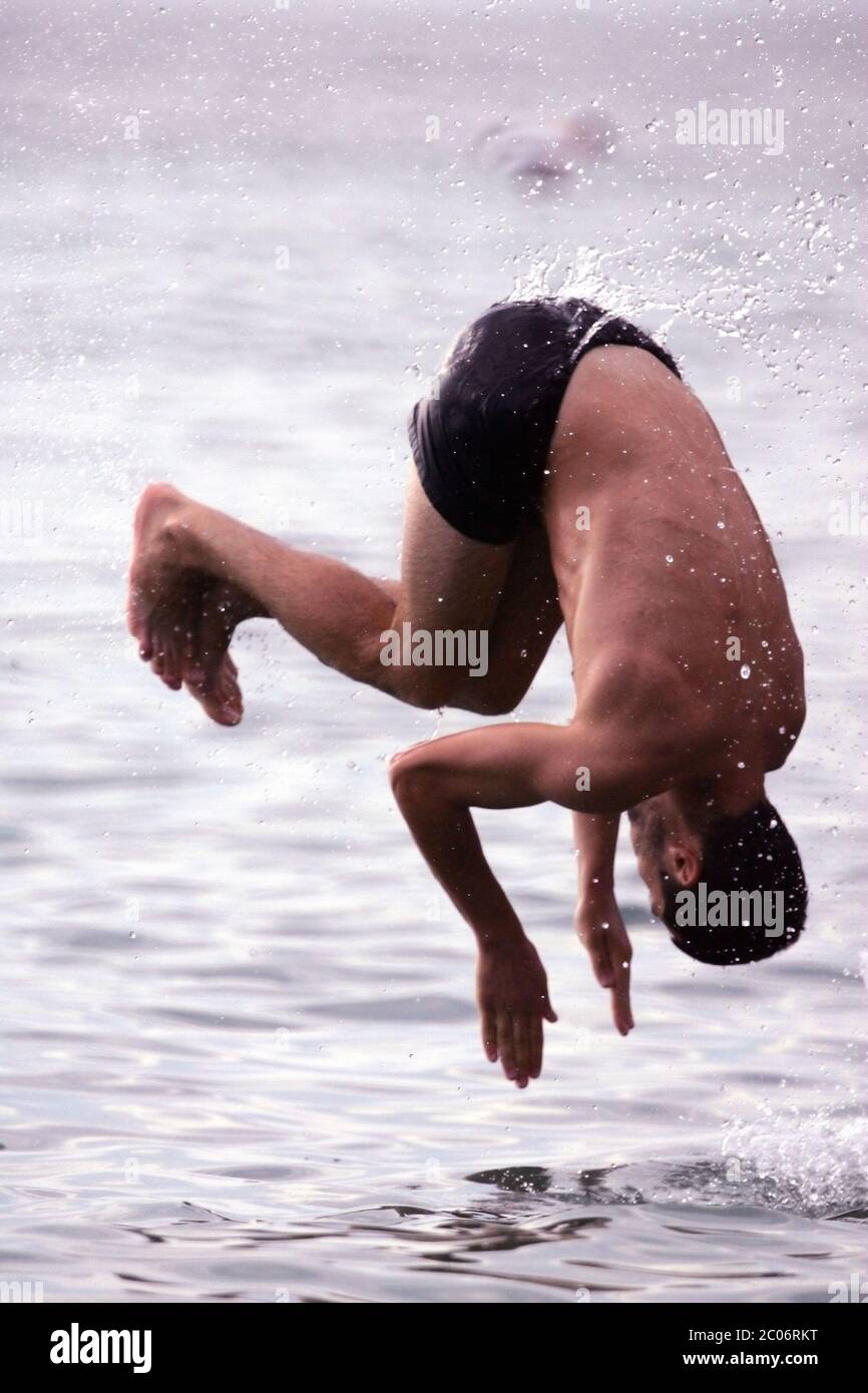 Back dive somersault hi-res stock photography and images - Alamy